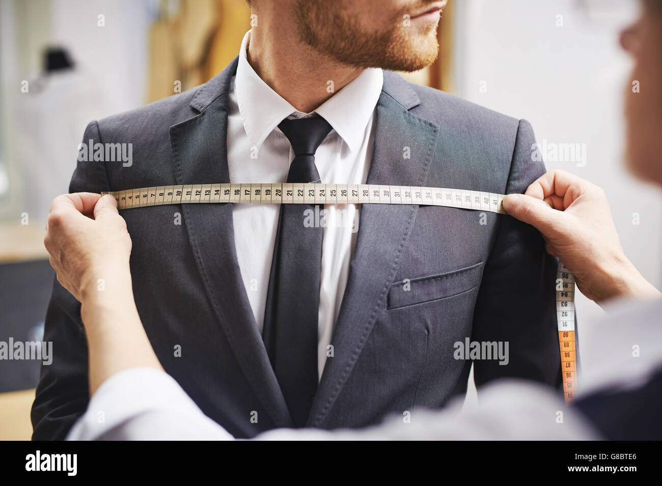 Measuring front of jacket Stock Photo - Alamy