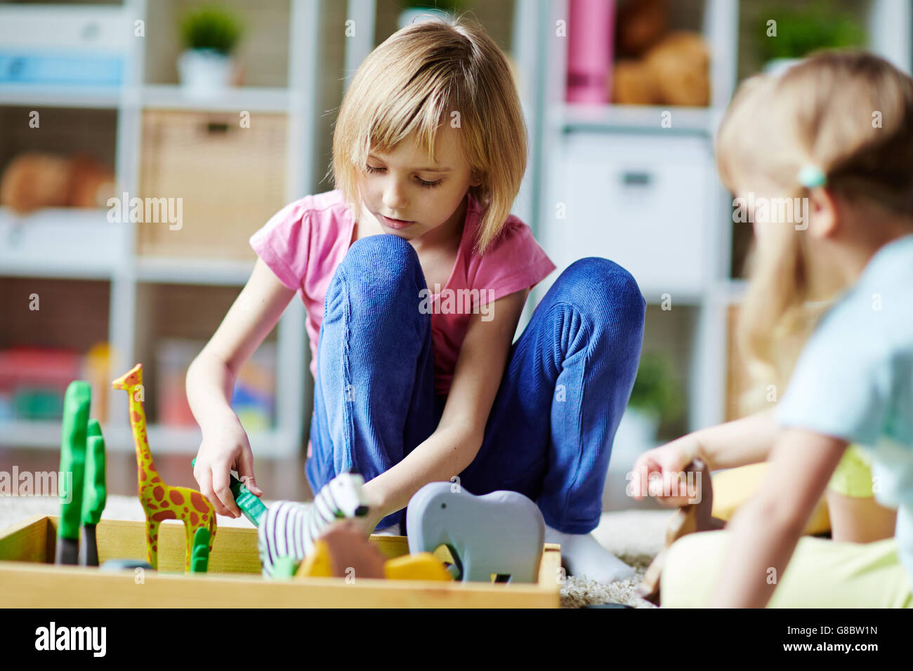 Play in kindergarten Stock Photo - Alamy