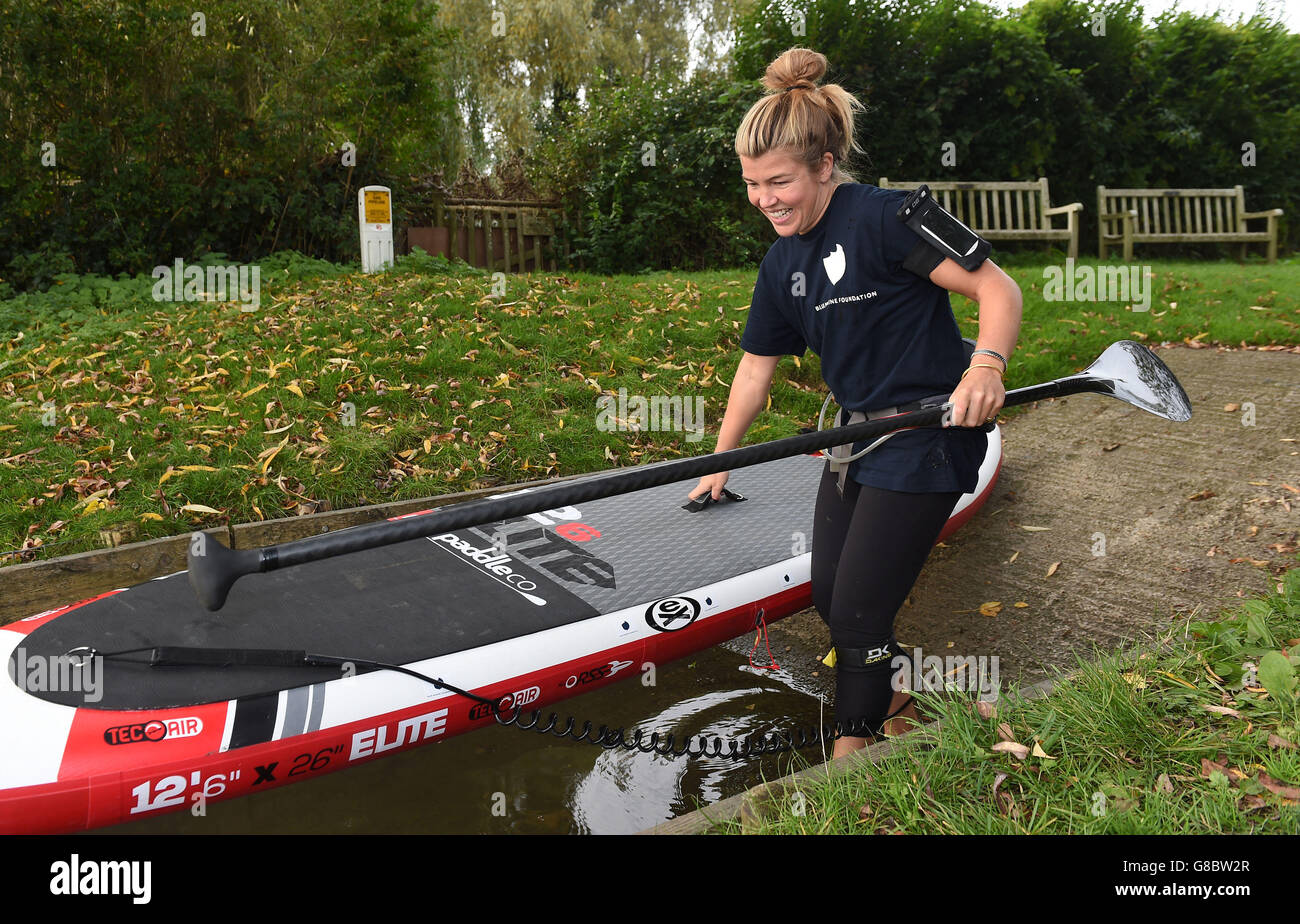 Amber Nuttall launches her paddle board into the River Thames at the ...