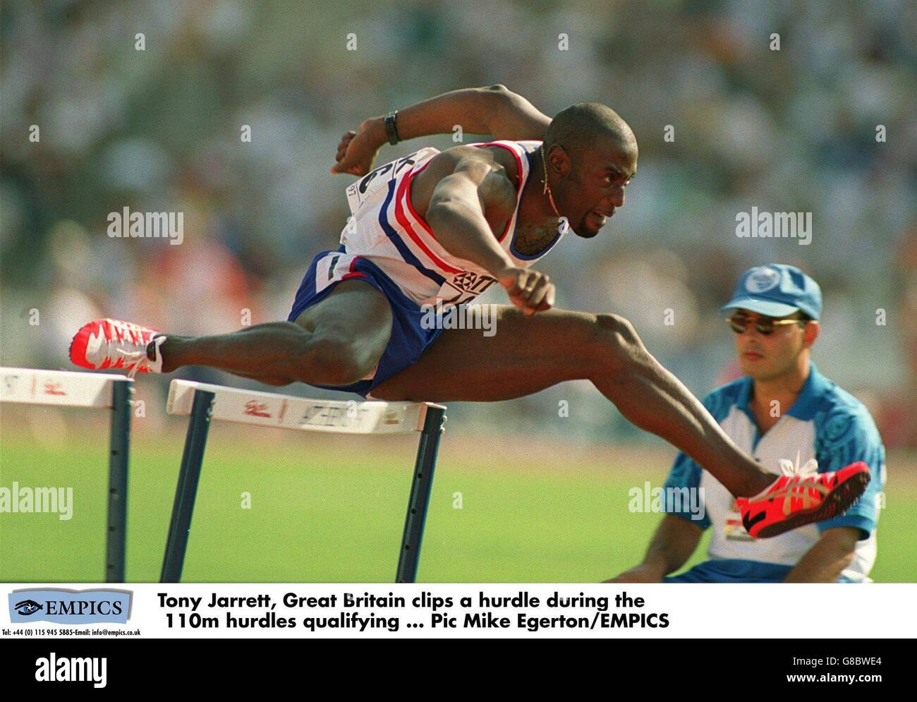 Tony Jarrett, Great Britain clips a hurdle during the 110m hurdles ...