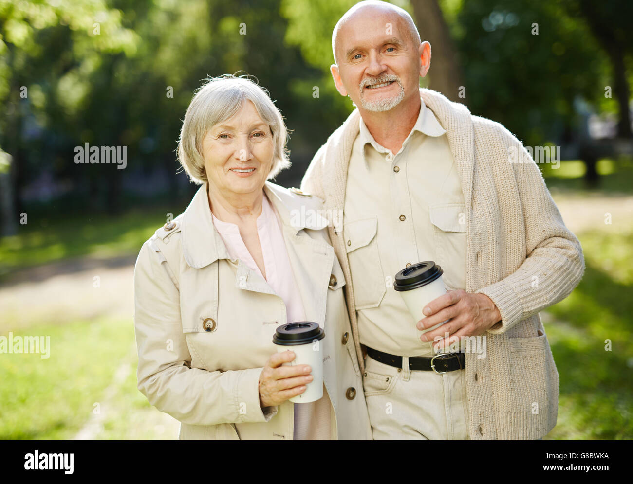 Seniors in park Stock Photo - Alamy