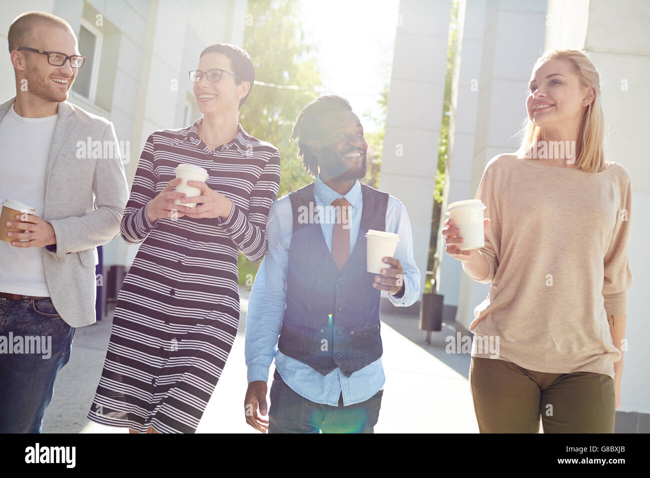 Talking during outdoor break Stock Photo - Alamy