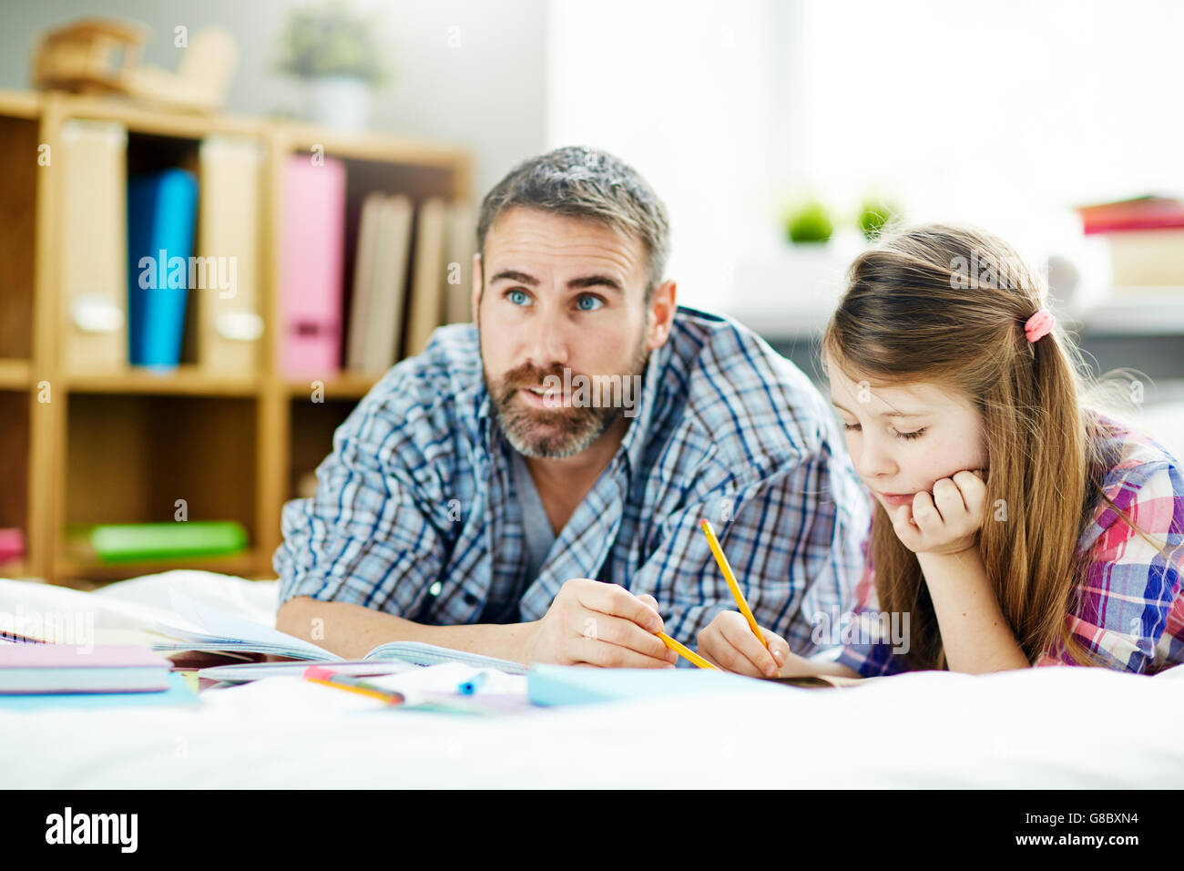 Drawing with daughter Stock Photo - Alamy