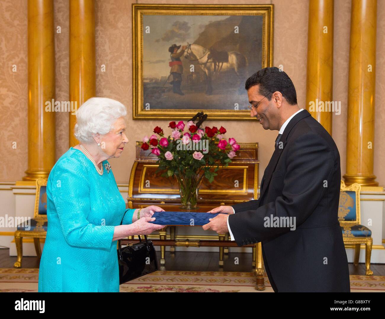Queen Elizabeth II grants the Ambassador of Iraq Salih Husain Ali an ...