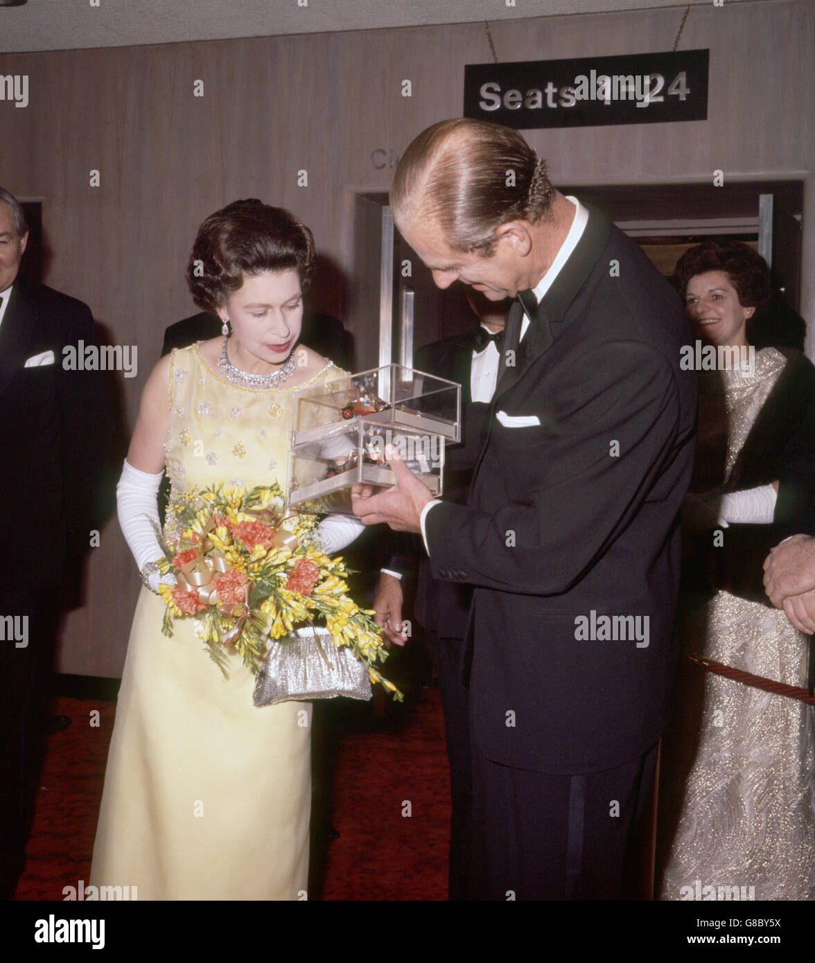 The Queen and the Duke of Edinburgh view the model vintage cars ...