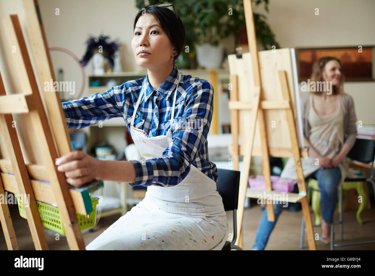 Working in art studio Stock Photo - Alamy