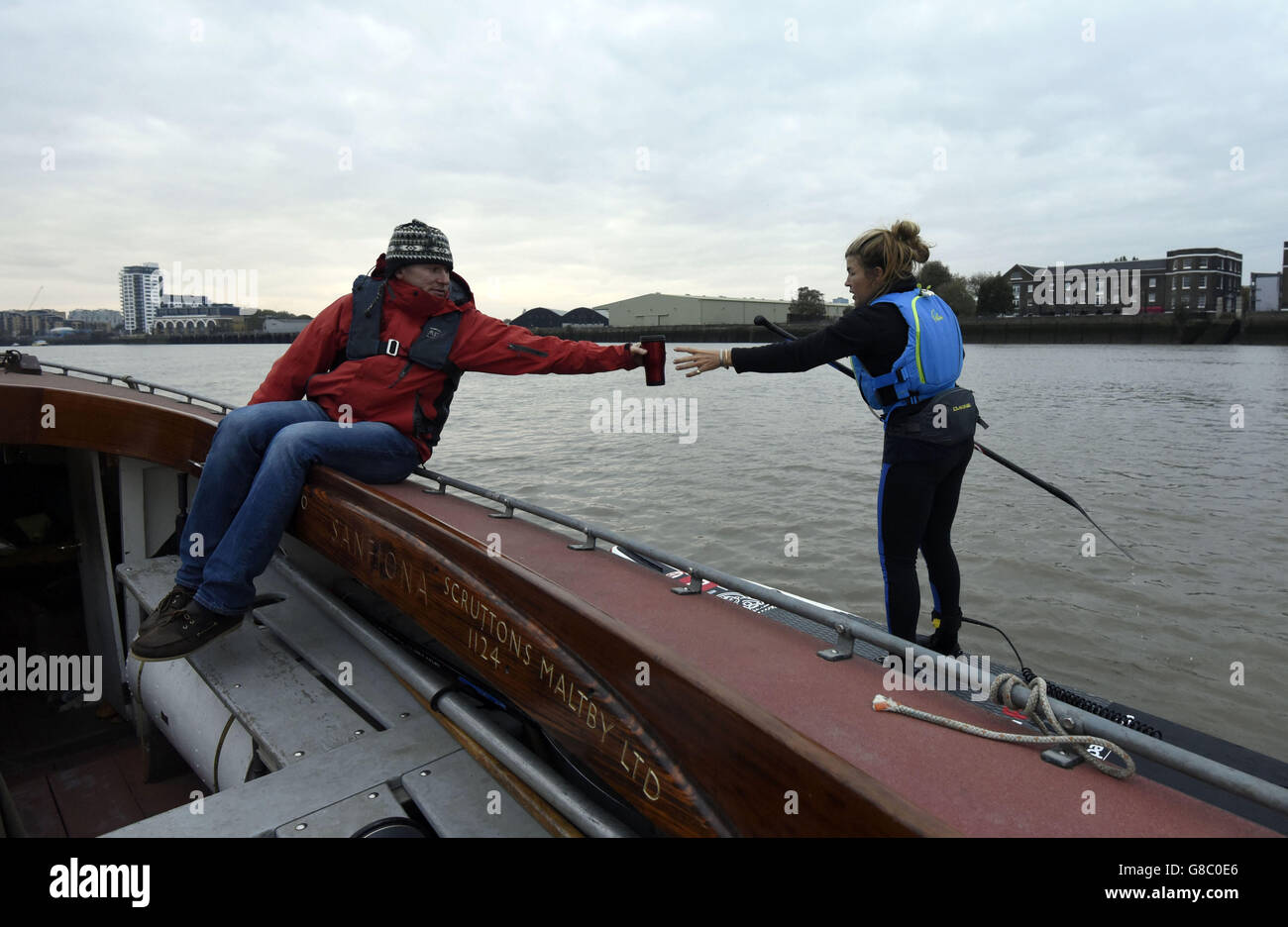 Amber Nuttall stops for a cup of tea passed to her by her boyfriend ...