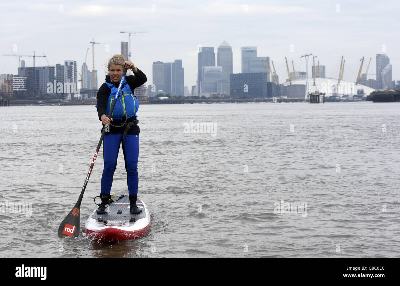 Amber Nuttall navigates her paddle board through London as she nears ...
