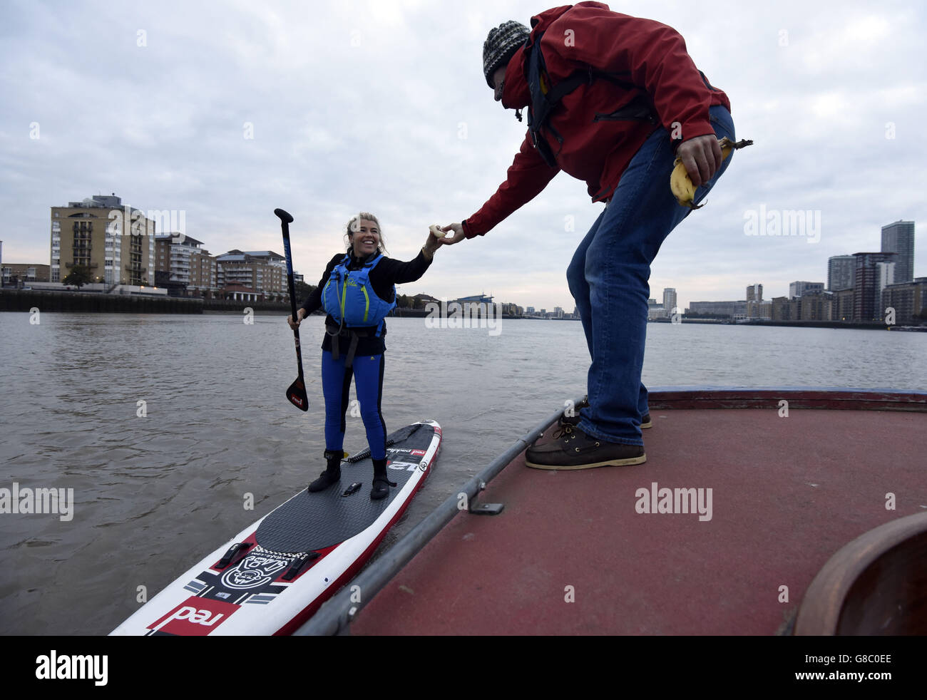 Amber Nuttall has a banana passed to her by her boyfriend Alistair ...