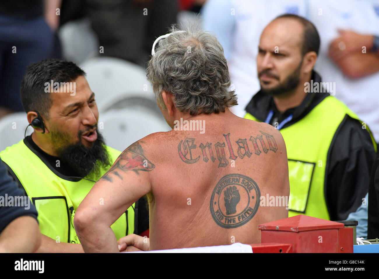 File picture - England Football fan with large England tattoo during ...