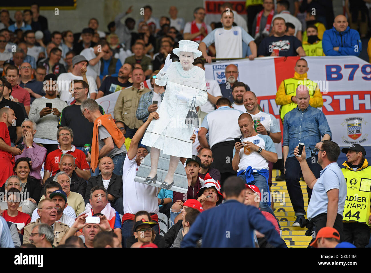File picture - England Football fans with life-size cutout of the Queen ...