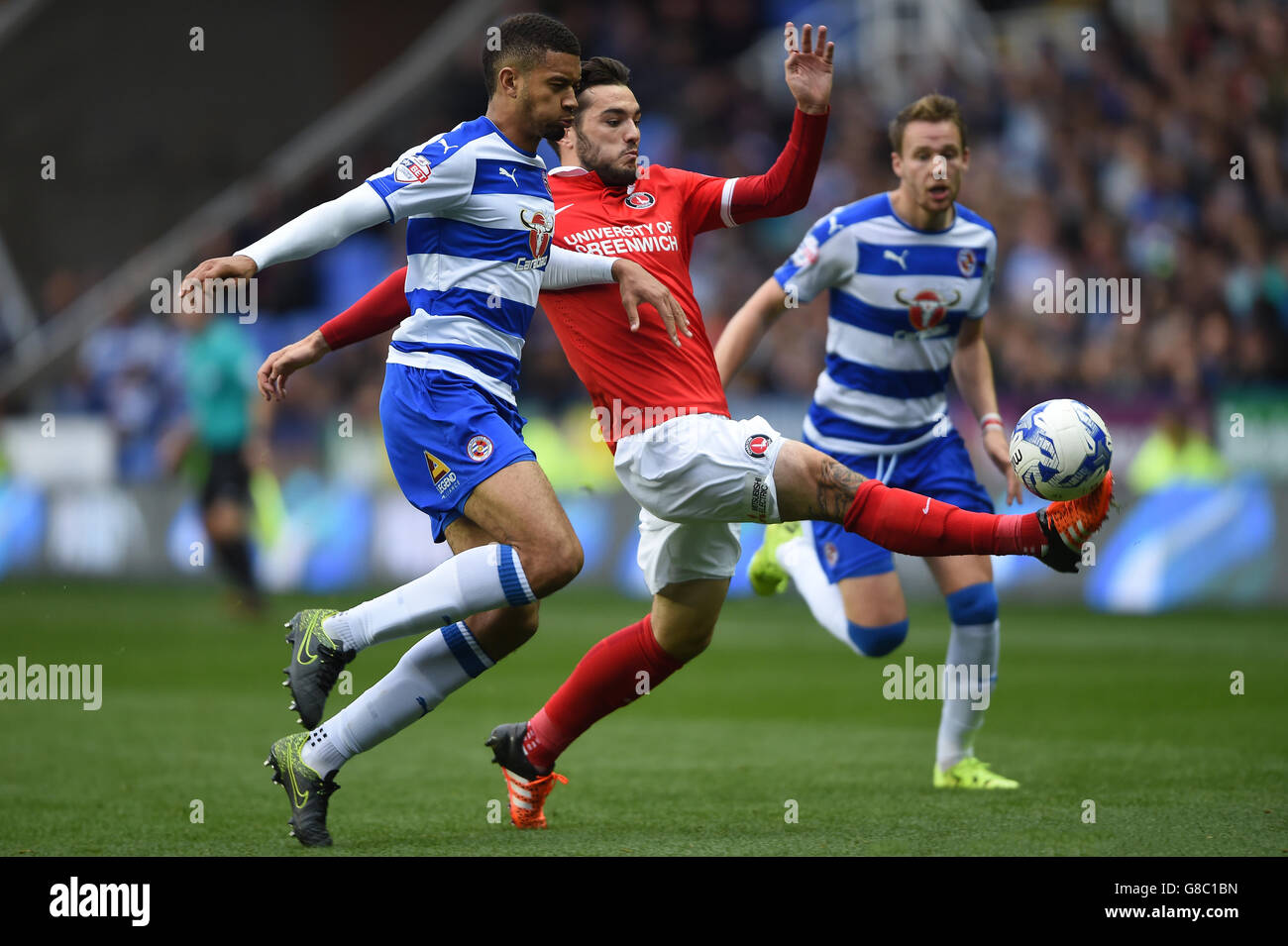 Charlton athletics tony watt battles with readings michael hector hi ...