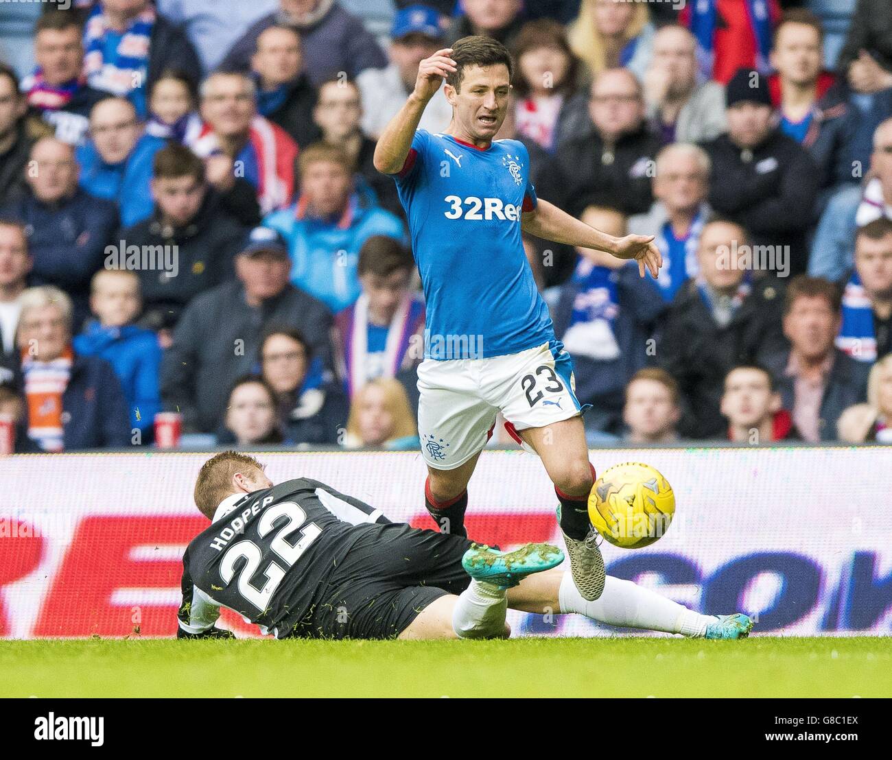 Queen of the South's Scott Hooper tackles Ranger's Jason Holt (right ...