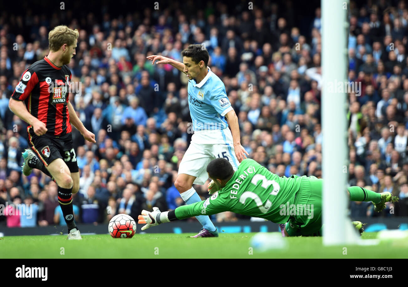 Manchester City's Jesus Navas (centre) skips around AFC Bournemouth ...
