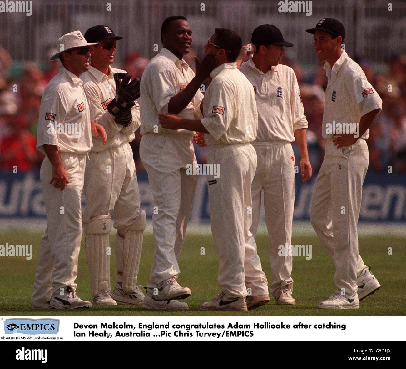 England congratulates adam hollioake after catching ian healy hi-res ...