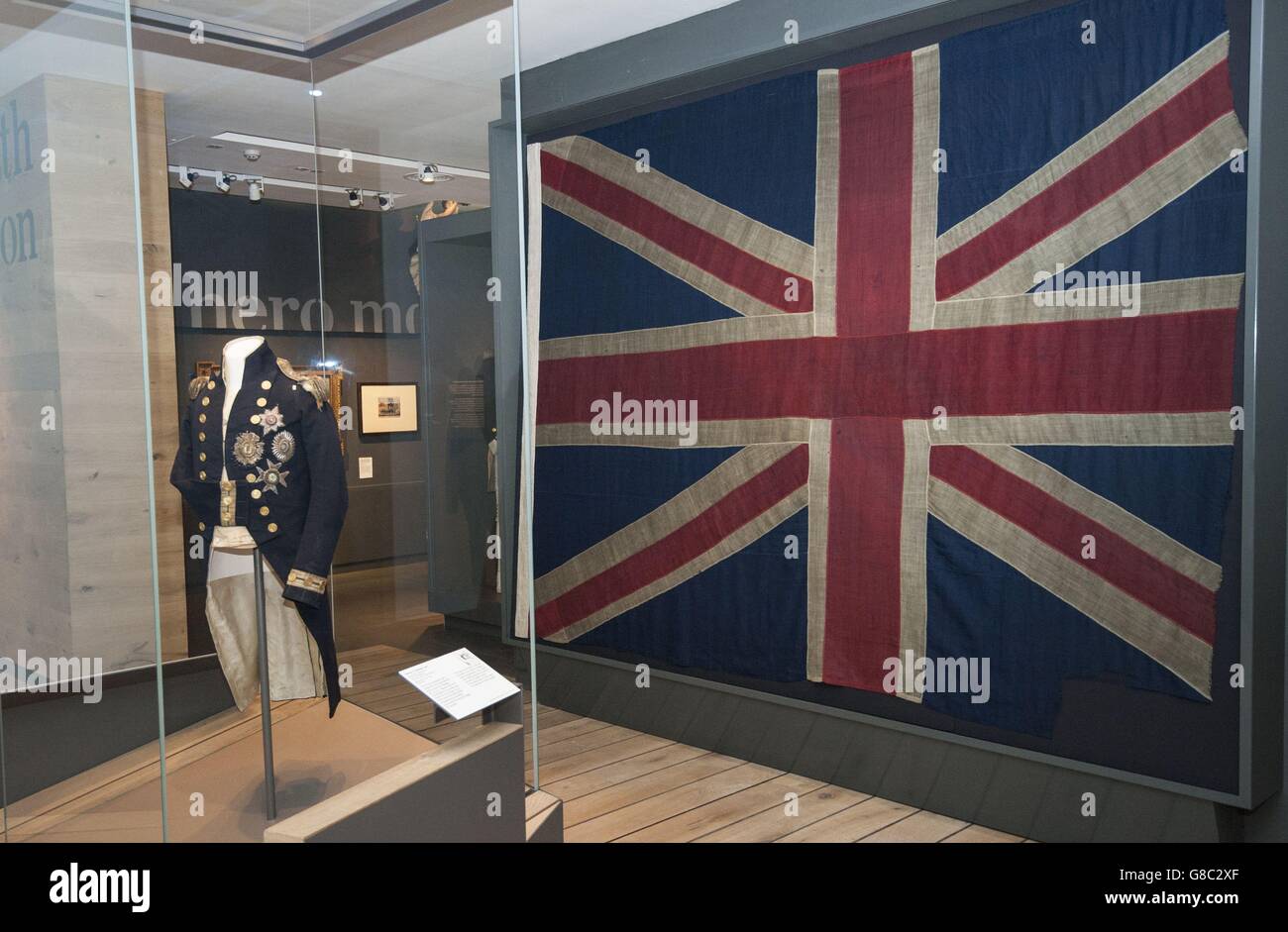 Lord Nelson's outfit (left) next to the union flag, previously flown at ...