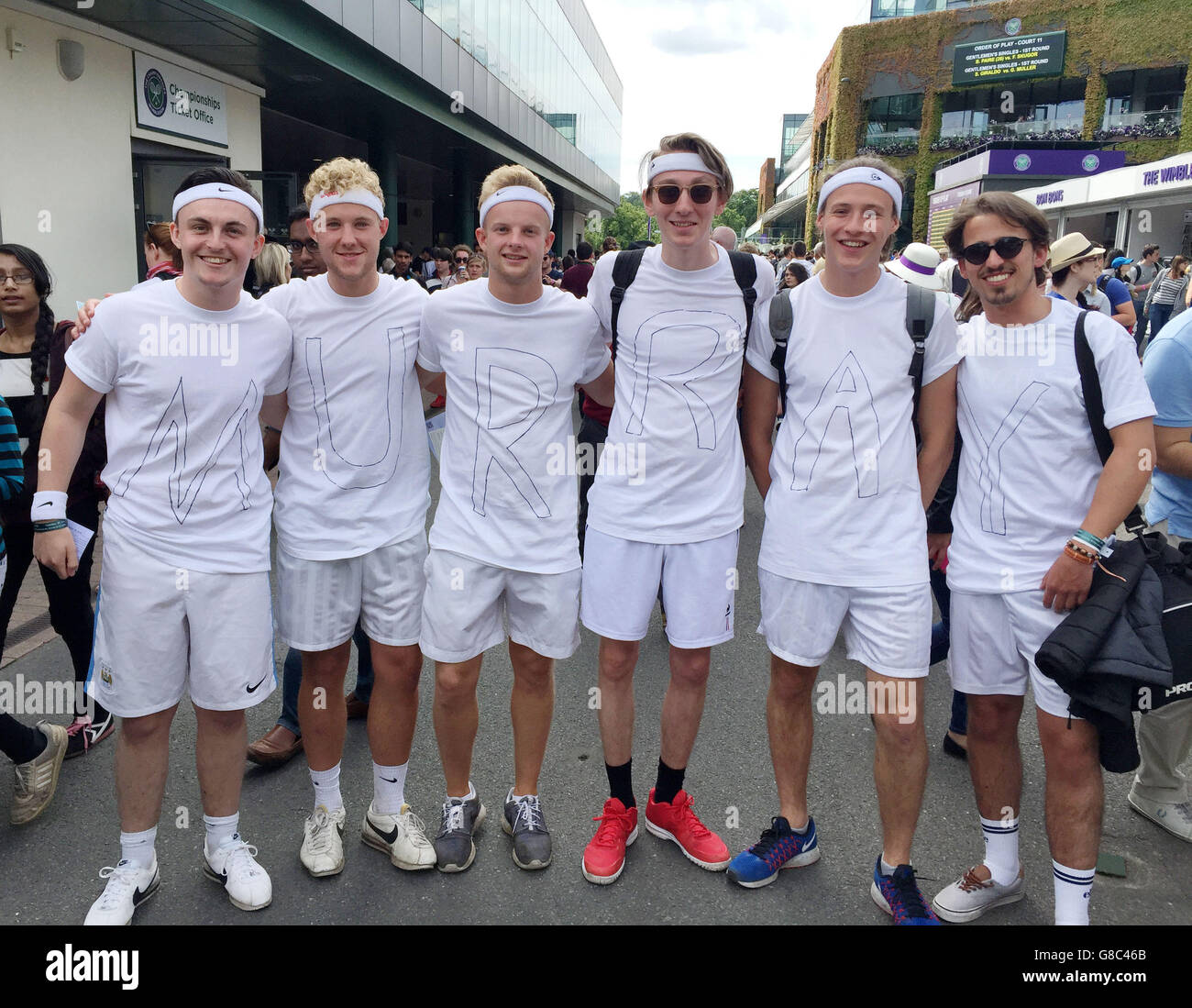 Will Booth (second left), 18, with friends who camped overnight, on day ...