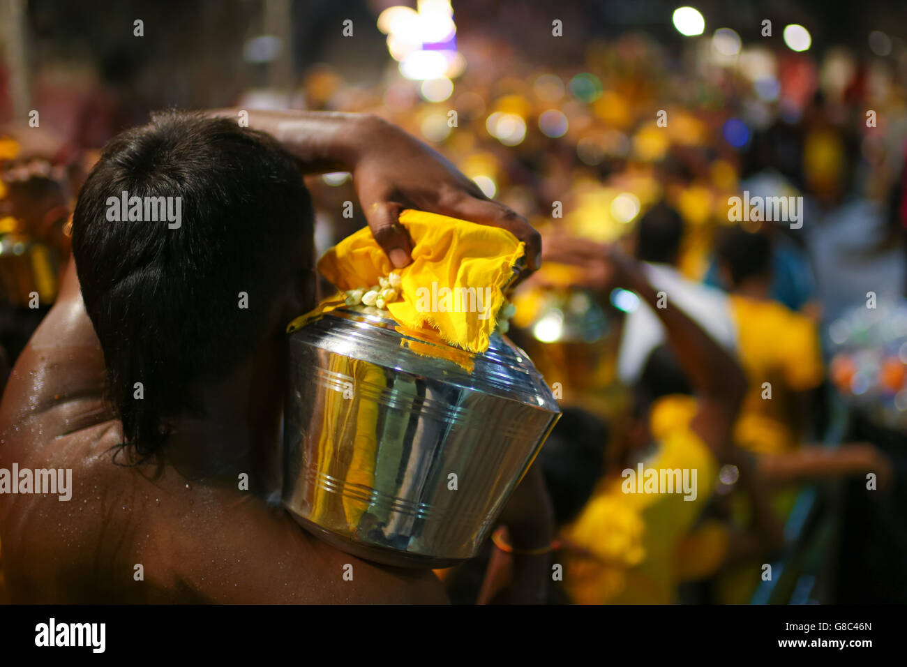 Hindu man carrying milk pot hi-res stock photography and images - Alamy