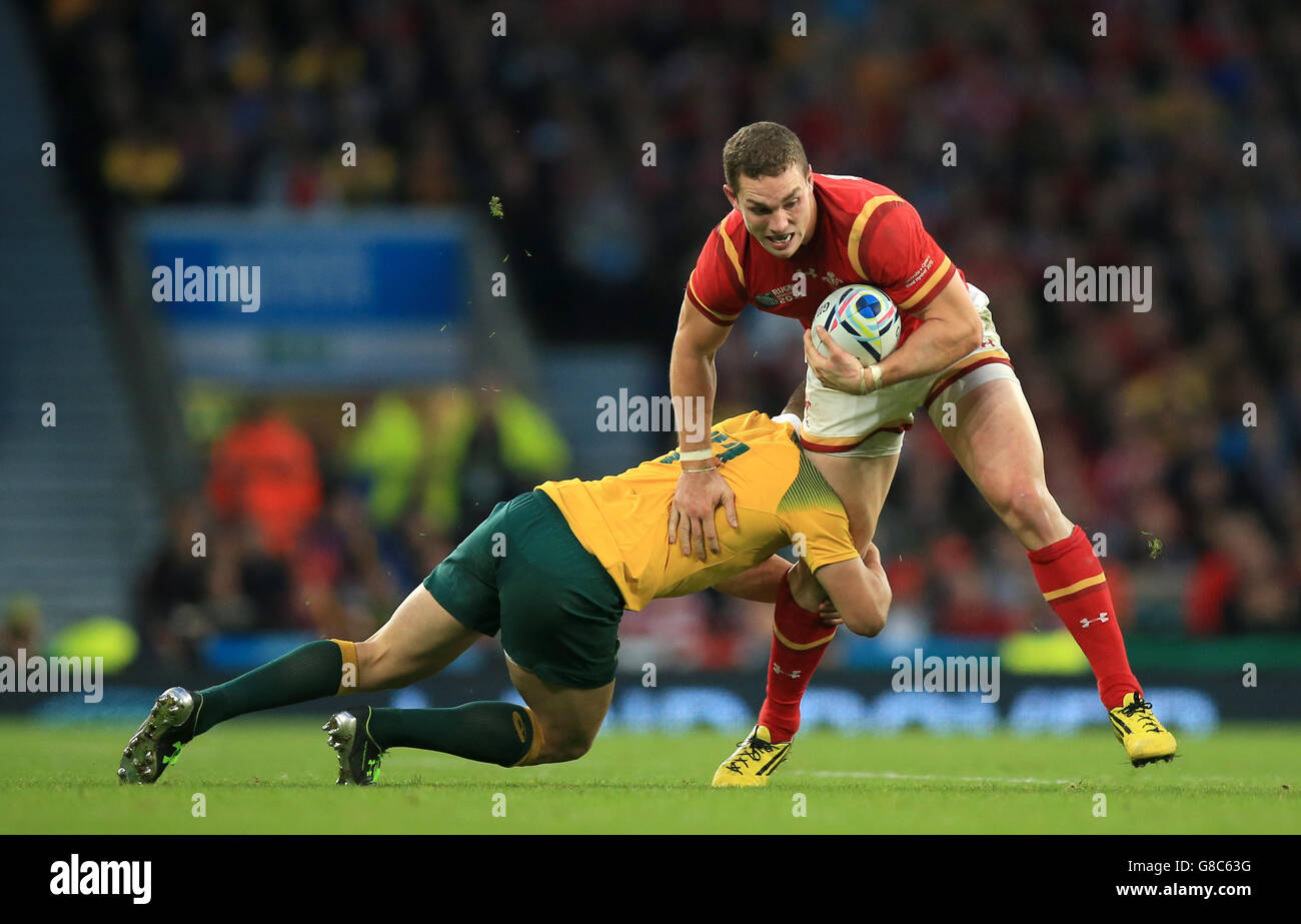 Australia's Drew Mitchell (left) tackles Wales' George North during the ...