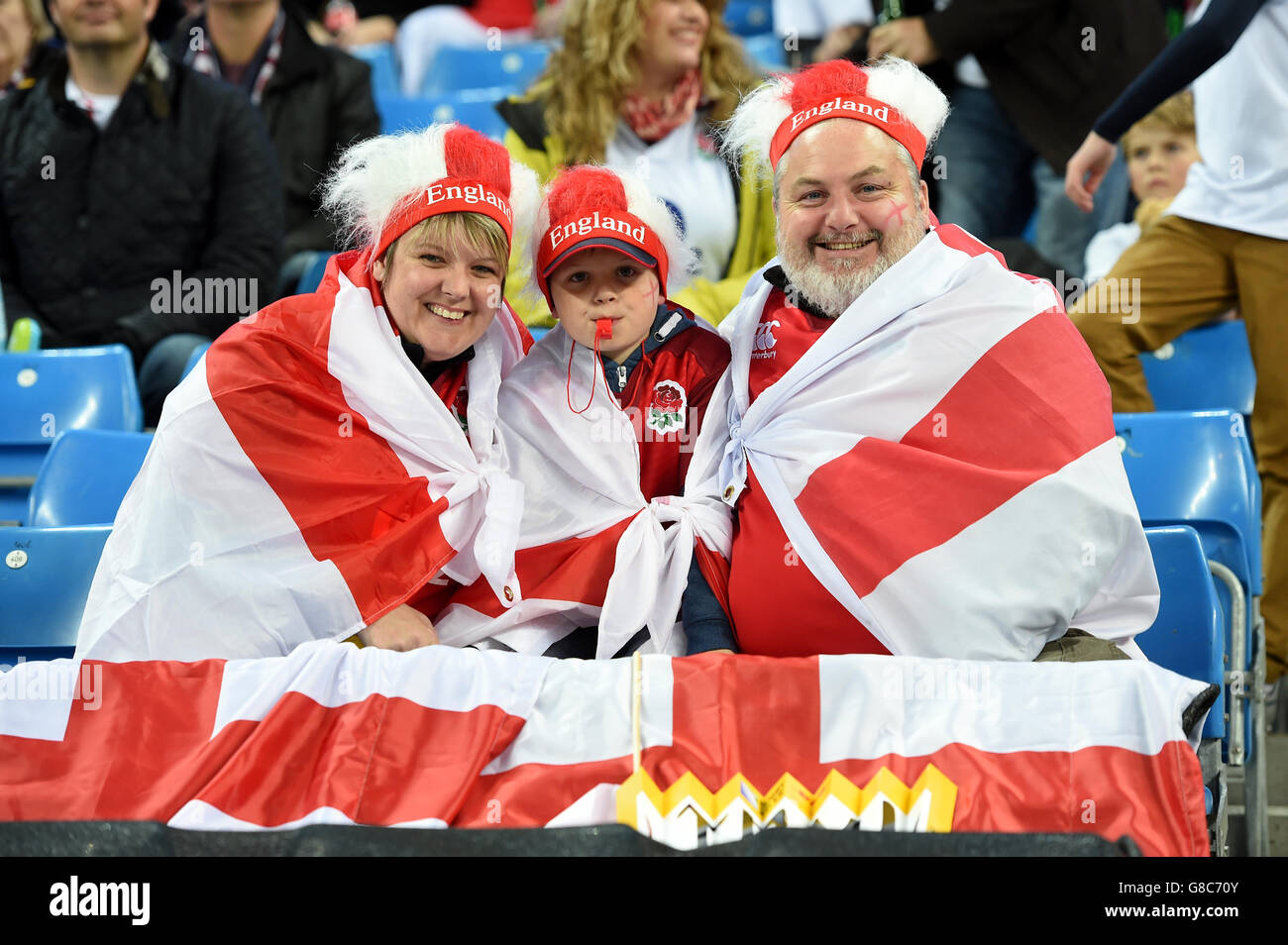 England fans wearing flags and colourful hats in the stands before the ...