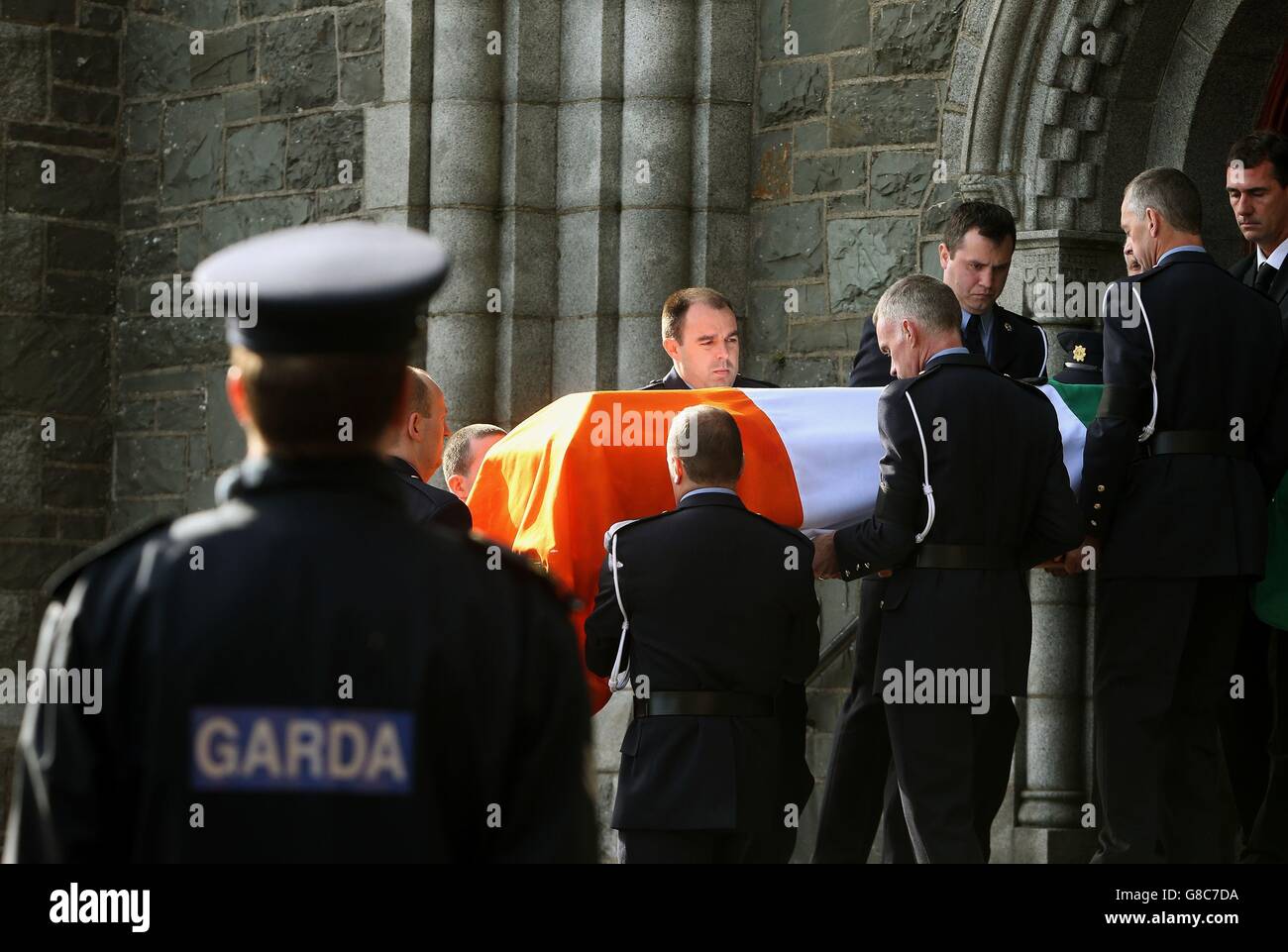 The coffin of Garda Tony Golden leaves St Oliver Plunkett Church, in ...