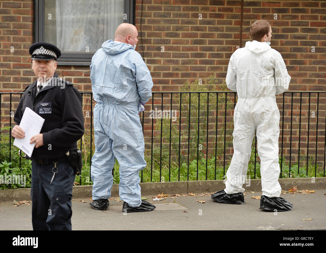 Forensic officers prepare to search the area near to the junction of ...