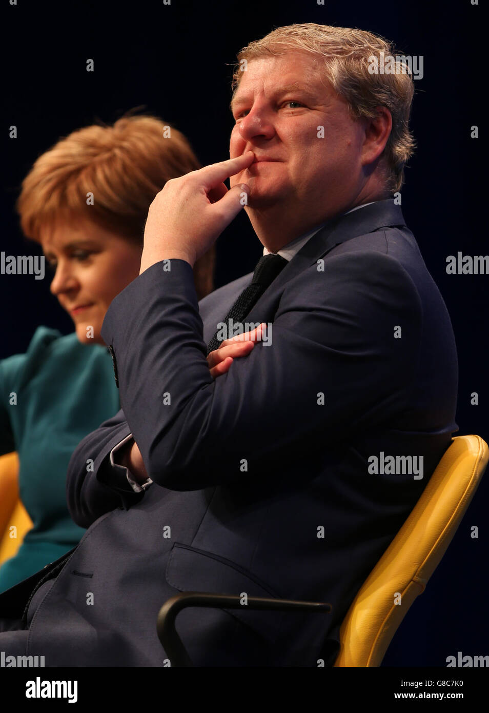 SNP Westminster leader Angus Robertson sits next to SNP leader Nicola ...