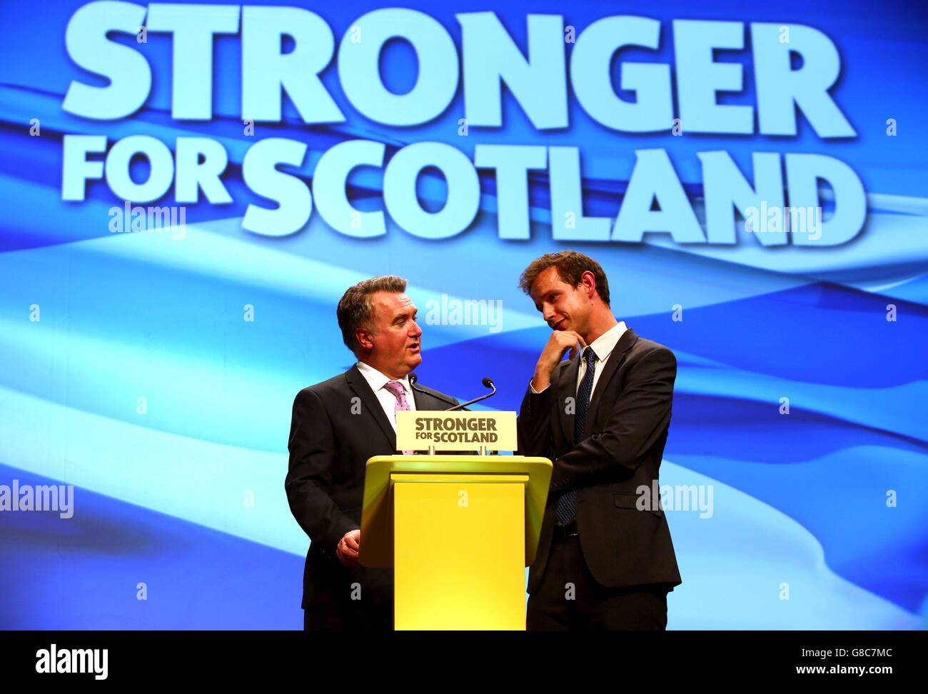 Wesminster SNP MPs Jon Nicolson and Callum McCaig (right) on stage ...