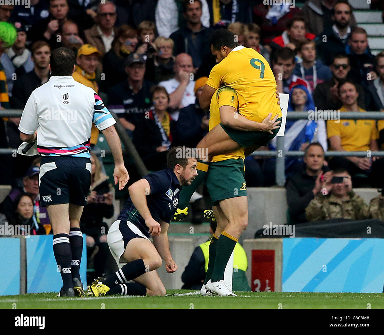 Australia's Drew Mitchell celebrates scoring his team's fourth try with ...