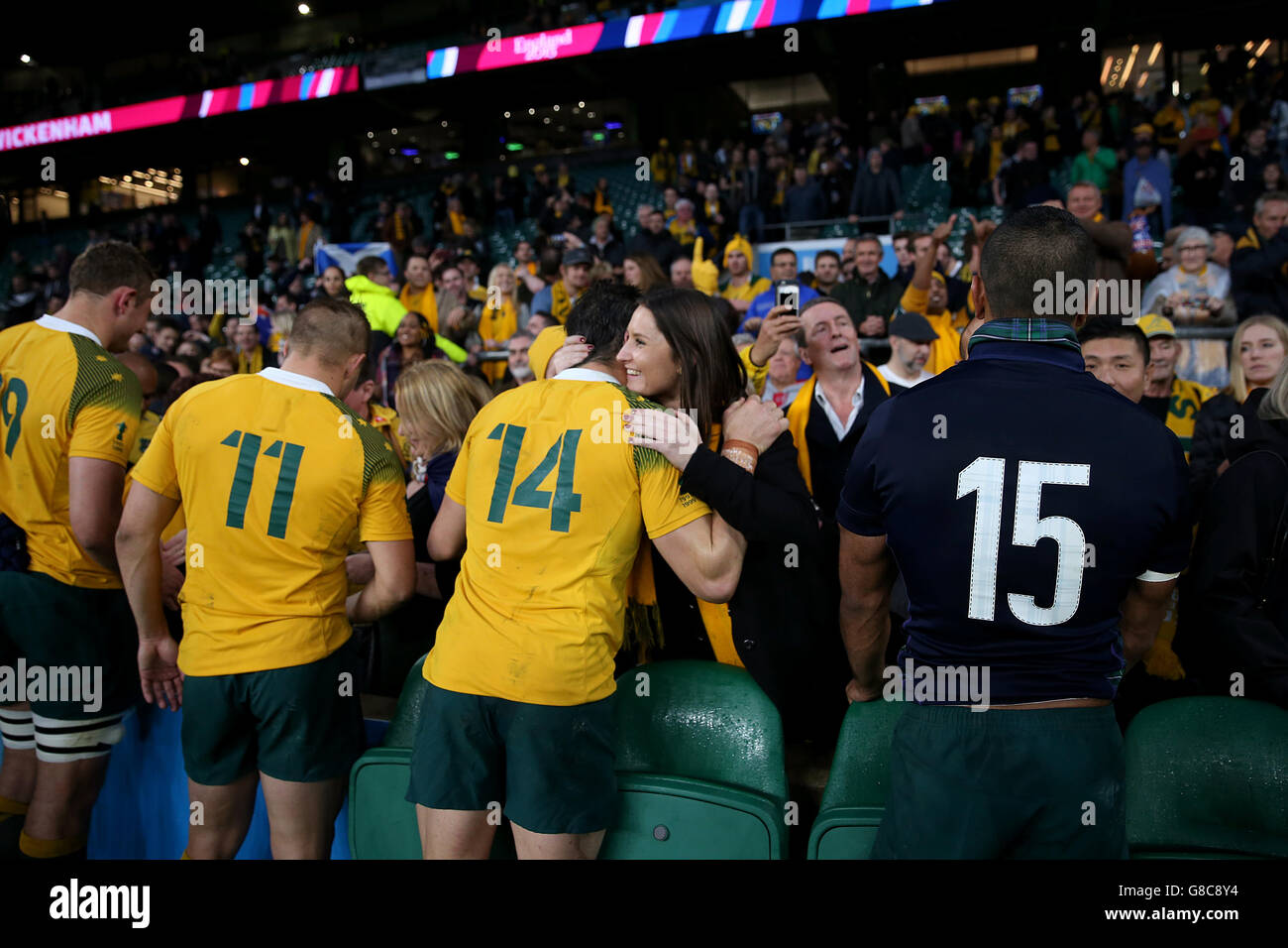 Australia players celebrate with friends and family after the final ...