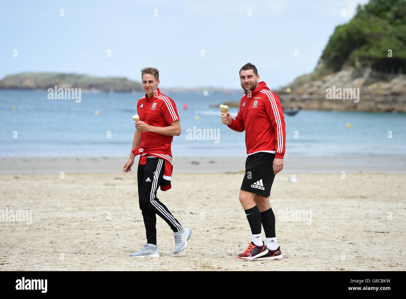 Wales' David Edwards (left) and Sam Vokes (right) eat ice creams on the ...