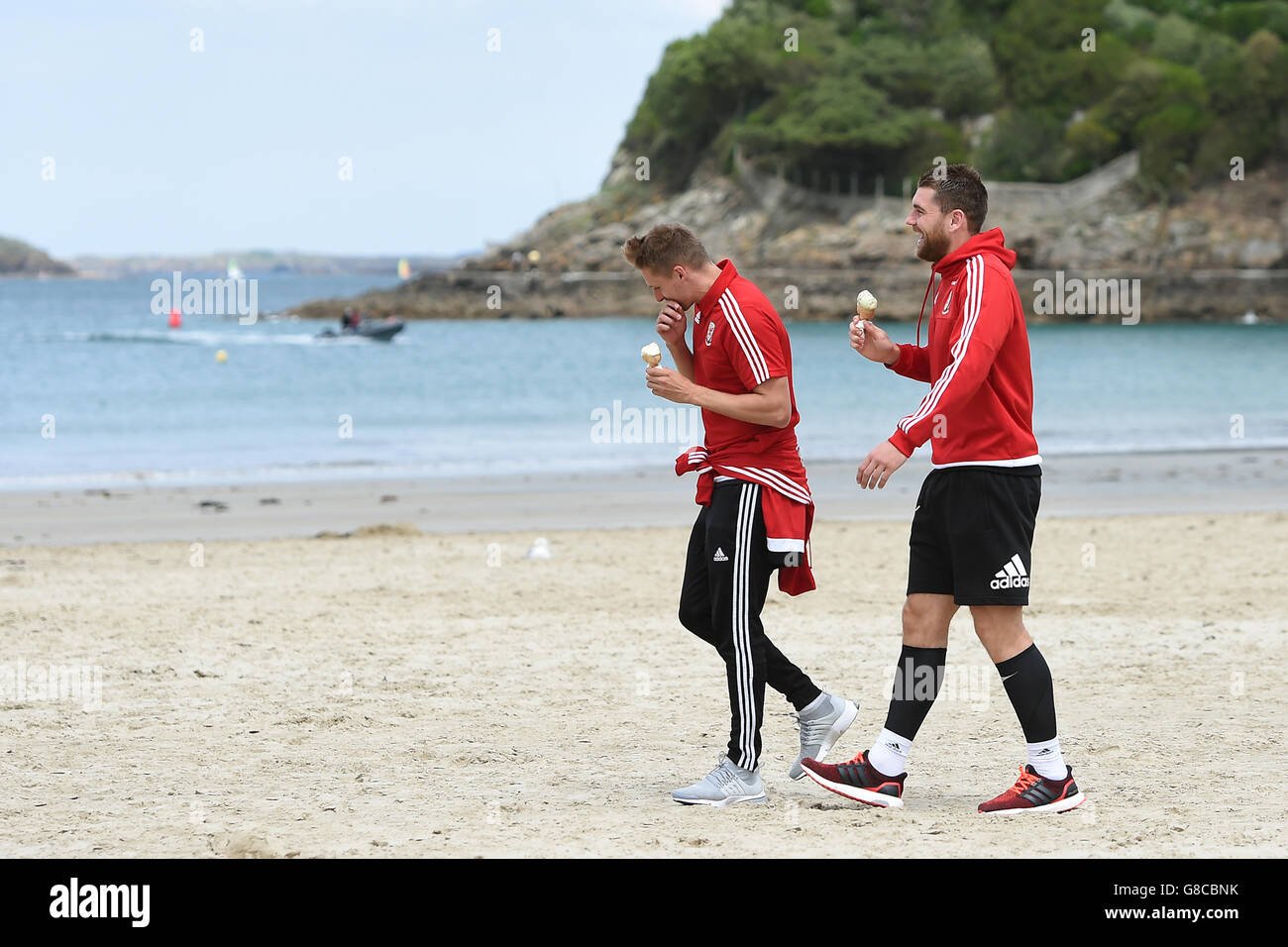 Wales' David Edwards (left) and Sam Vokes (right) eat ice creams on the ...