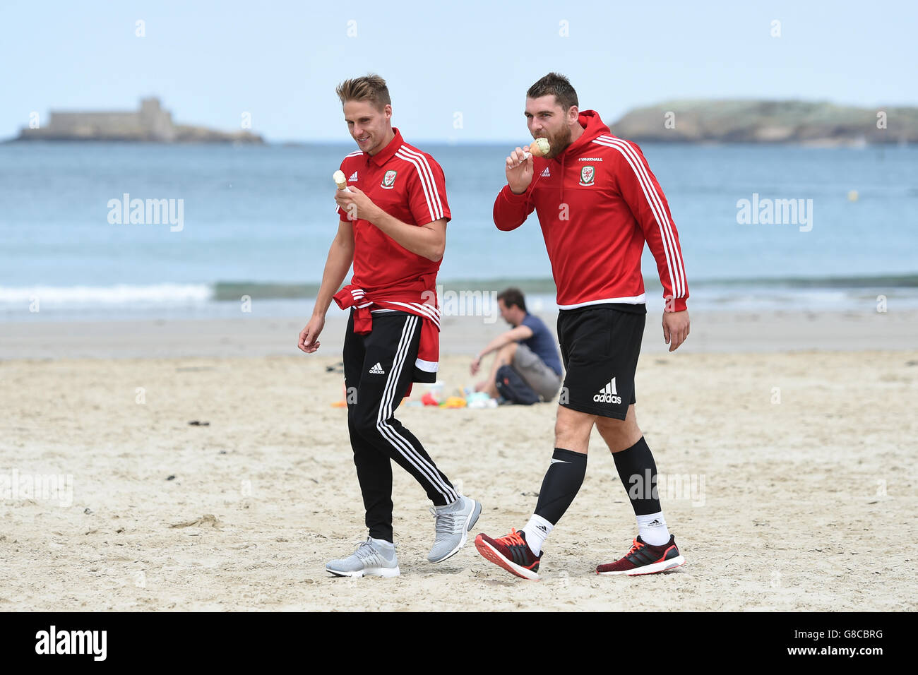 Wales' David Edwards (left) and Sam Vokes (right) eat ice creams on the ...