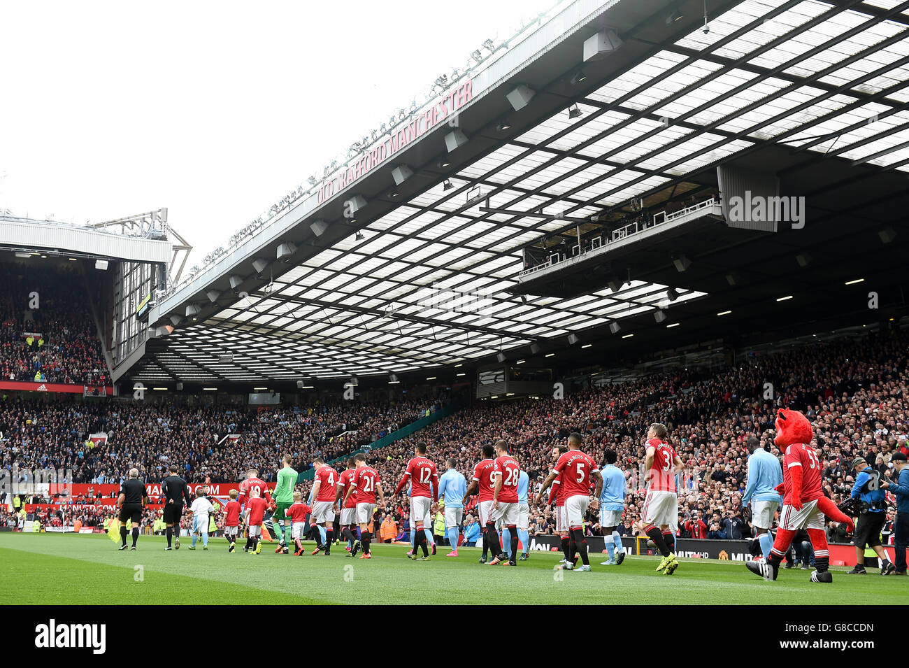 The two teams walk out old trafford before match hi-res stock ...