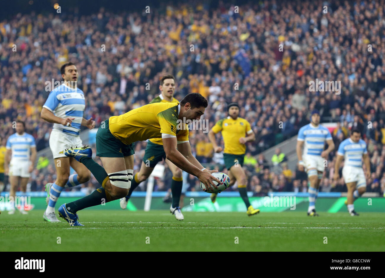 Australia's Rob Simmons scores his side's first try during the Rugby ...