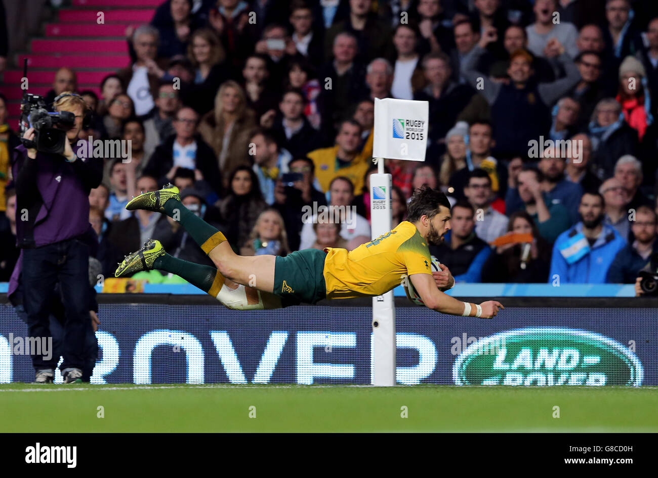 Australia's Adam Ashley-Cooper scores his second try and his side's ...