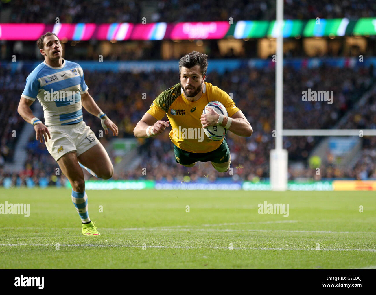 Australia's Adam Ashley-Cooper scores his second try and his side's ...