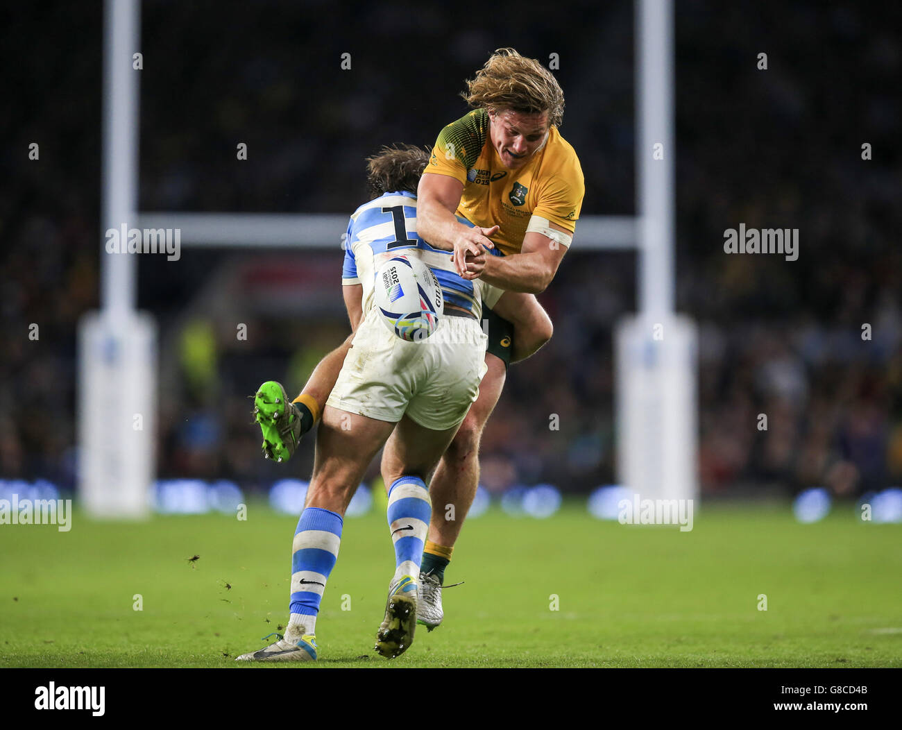 Argentina's Marcelo Bosch tackles Australia's Michael Hooper (right ...
