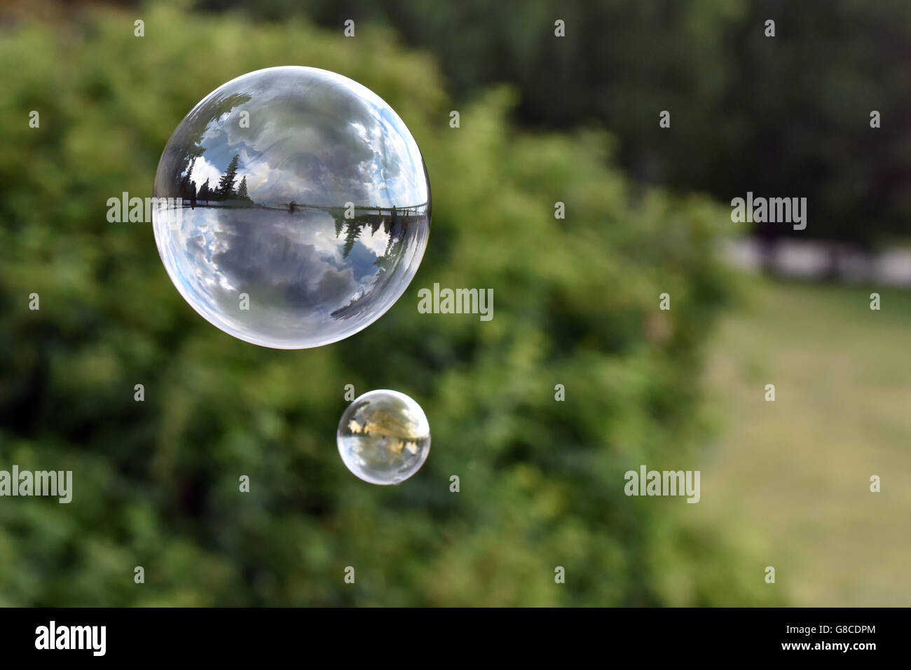 Flying through the air blowing bubbles close-up Stock Photo - Alamy