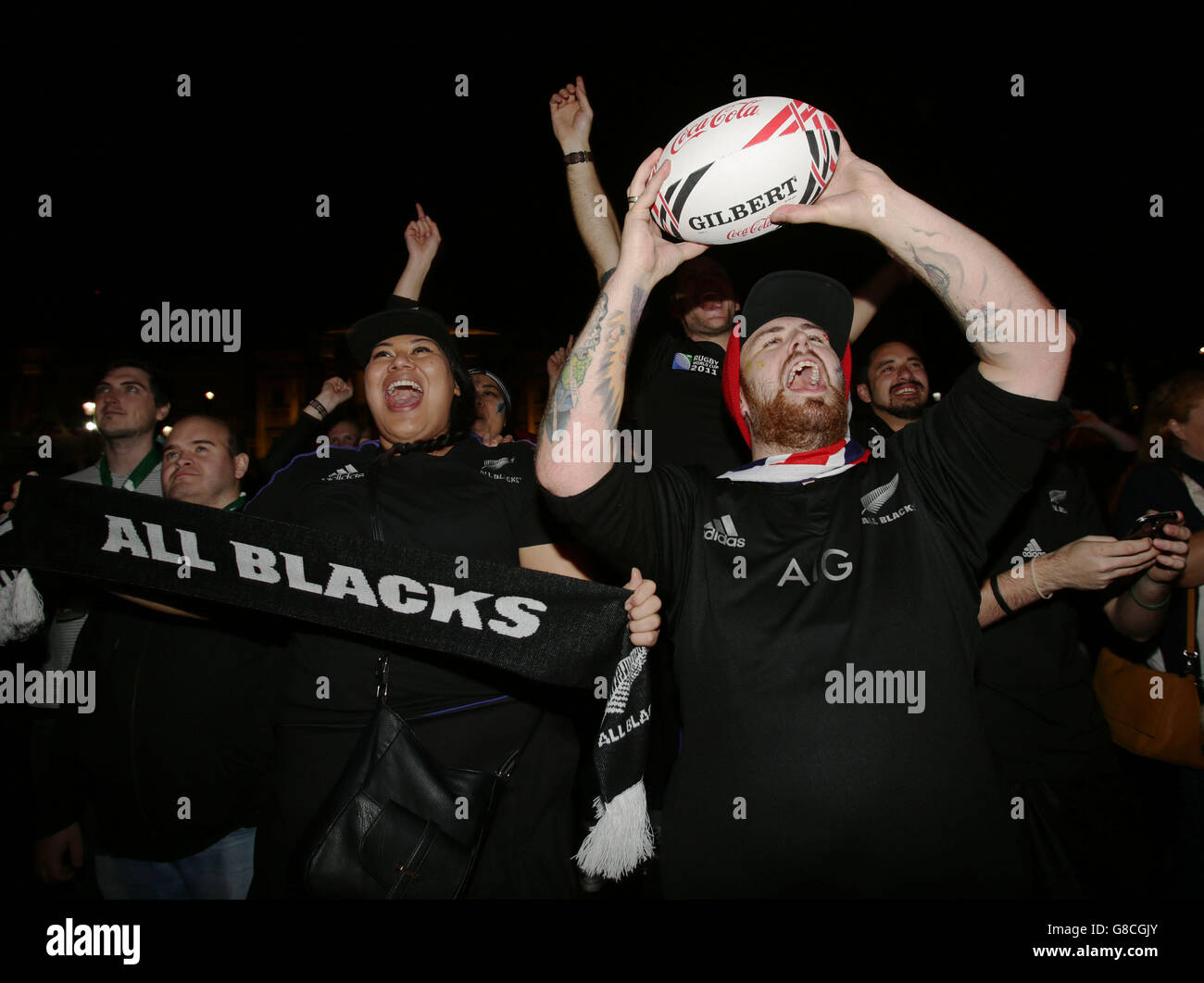 New Zealand rugby fans celebrate at the Fanzone in Trafalgar Square ...