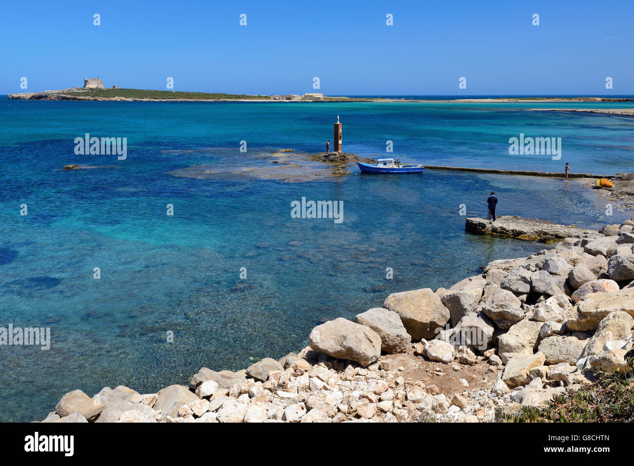Beach at Portopalo di Capo Passero, with distant view of Isola delle ...