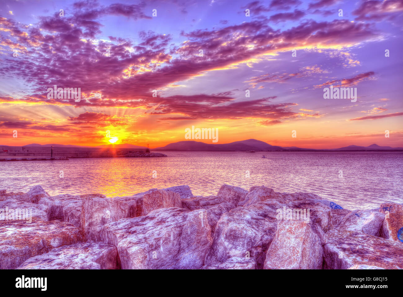 purple sunset in Alghero harbor, Sardinia. hdr tone mapping Stock Photo ...