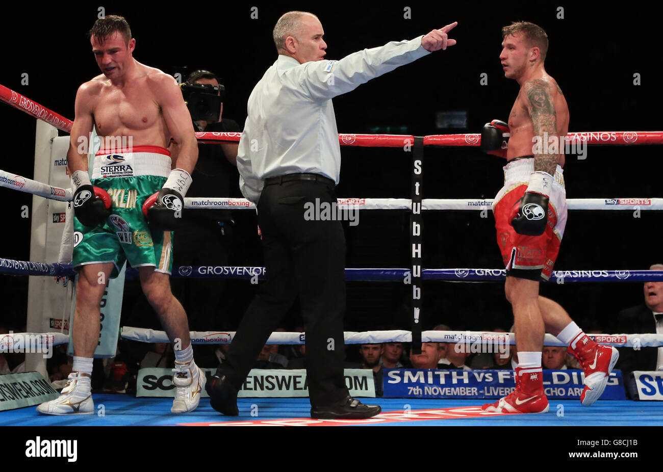 The referee orders back Jason Welborn after hitting Matthew Macklin ...
