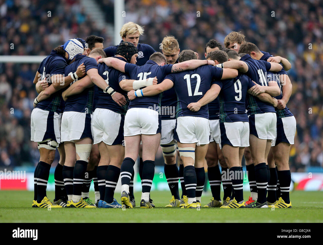 Scotland players in a team huddle before the Rugby World Cup match at ...