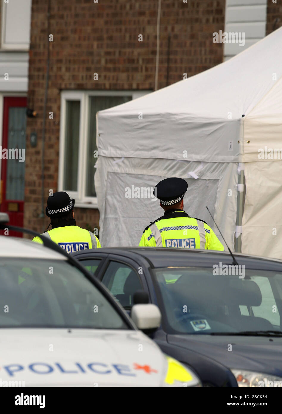Police at the scene in Duck Lane, St Neots, Cambridgeshire, after a man ...