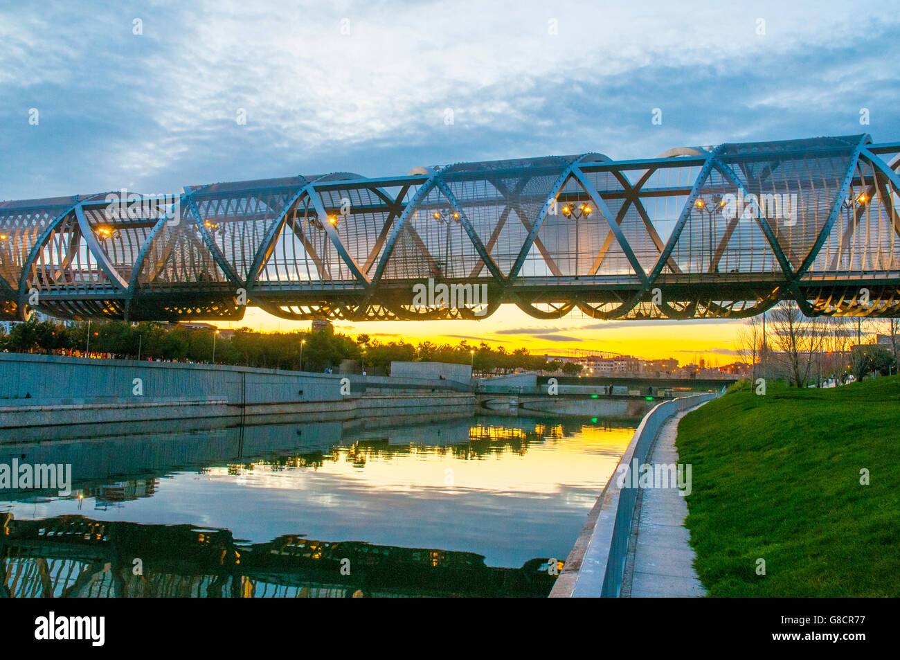 Perrault bridge and river Manzanares at dusk. Madrid Rio park, Madrid ...