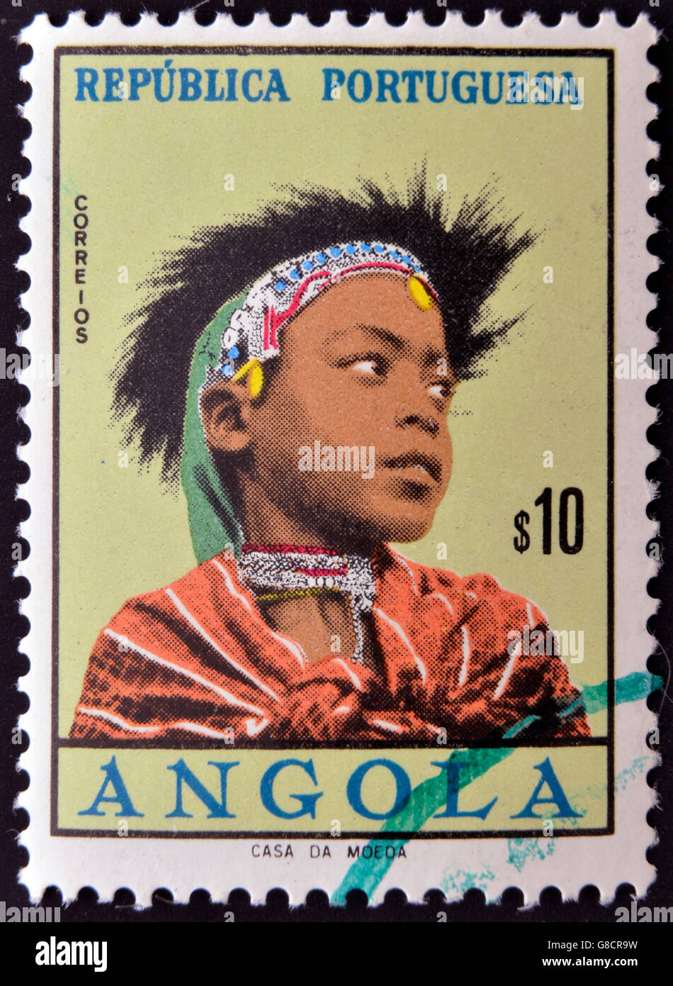 ANGOLA - CIRCA 1961: A stamp printed in Angola shows portrait of a ...