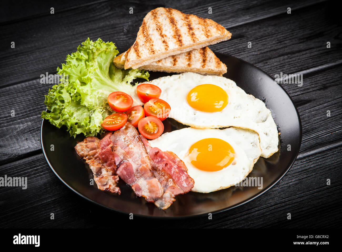Traditional breakfast on a plate Stock Photo - Alamy