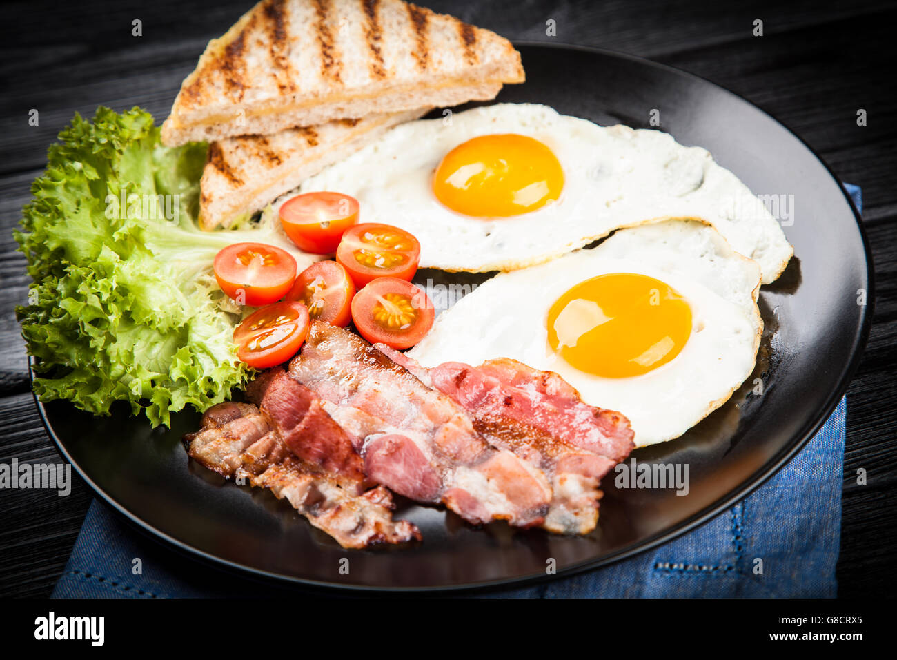 Traditional breakfast on a plate Stock Photo - Alamy
