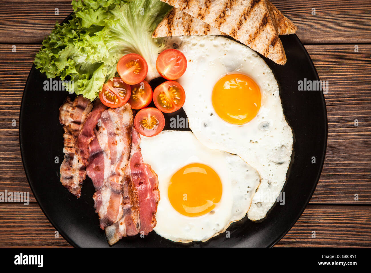 Traditional breakfast on a plate Stock Photo - Alamy